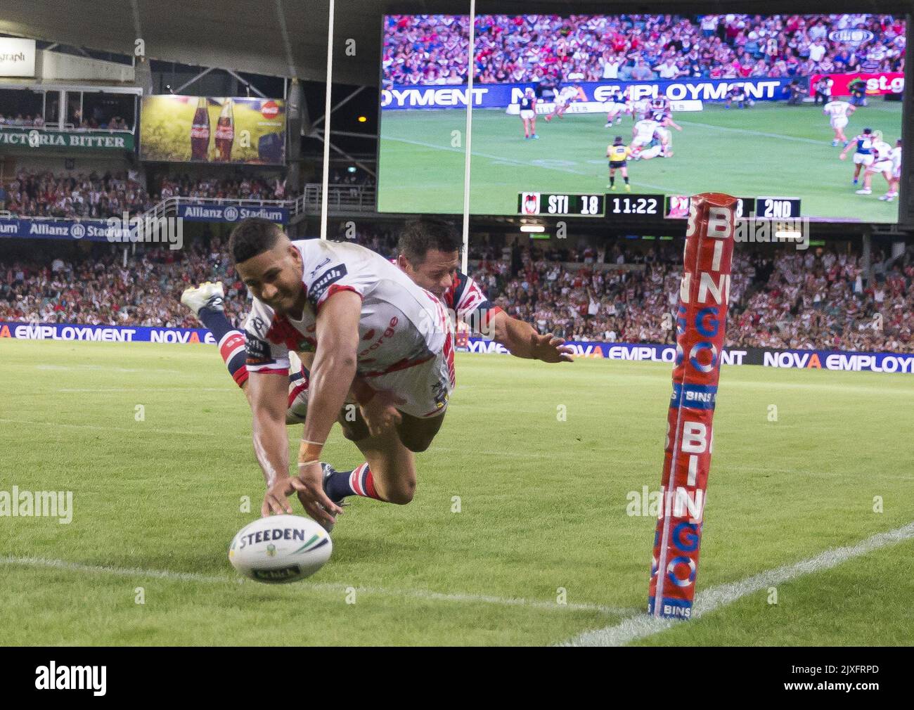 Nene MacDonald of the Dragons scores during the Round 8 NRL match ...