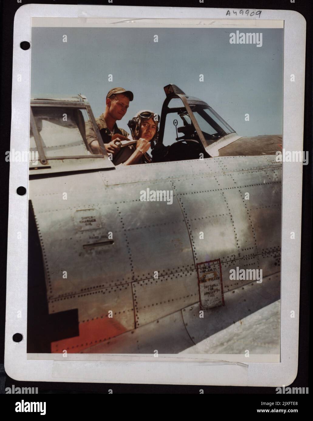 Pilot Lt. Mohawk Being Helped Into Parachute By Crew Chief. Italy Stock ...