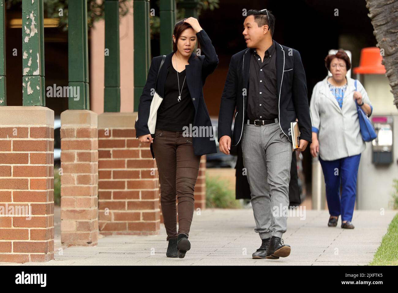 Curtis Cheng's daughter Zilvia (left) and son Alpha arrive at ...