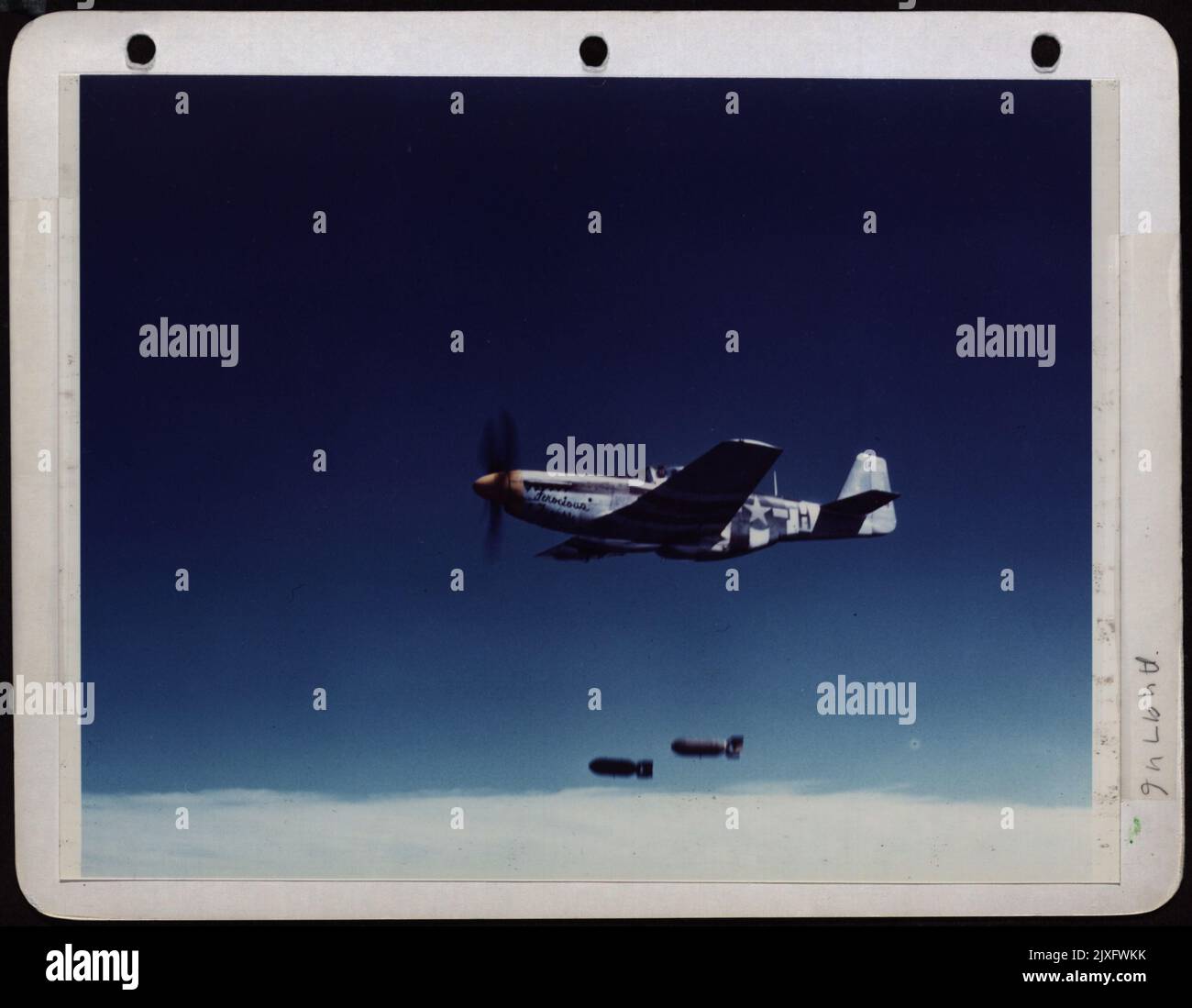 Side View Of A P-51 Of The 8Th Air Force Dropping 500 Lb. Bombs On A ...