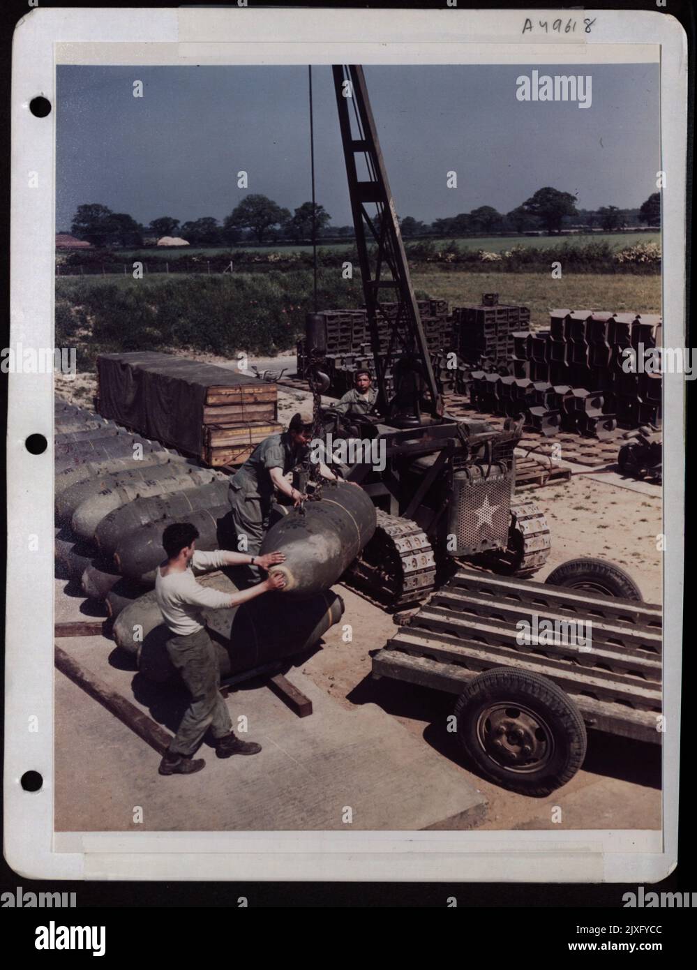 Ordance Crew Loading Bomb On Trailer, 8Th Af Stock Photo - Alamy