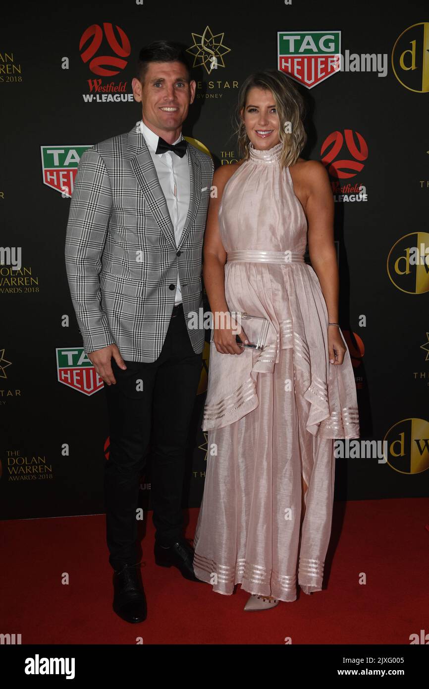 A-League player Liam Reddy (left) and his wife Christie Reddy arrive ...