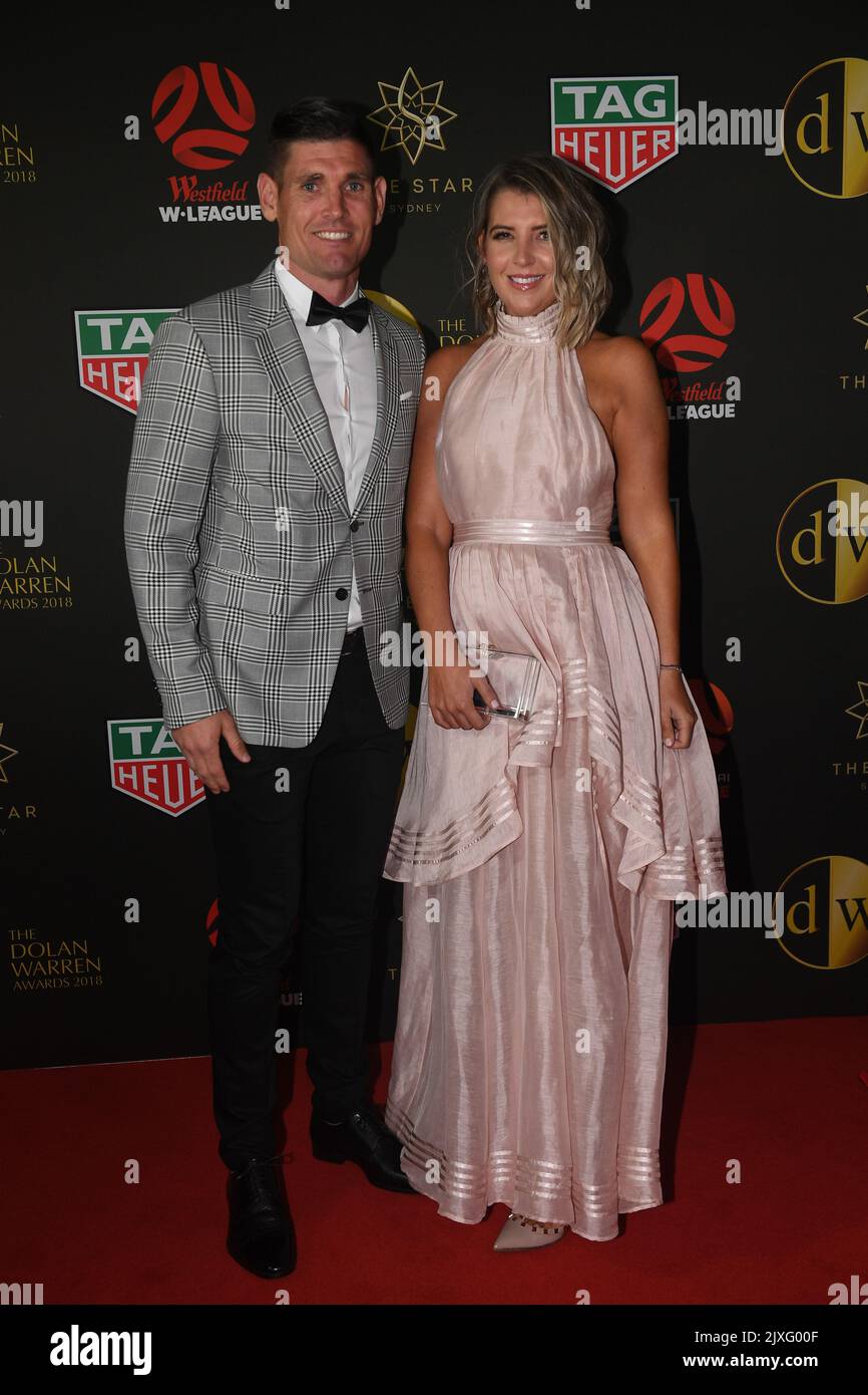 A-League player Liam Reddy (left) and his wife Christie Reddy arrive ...