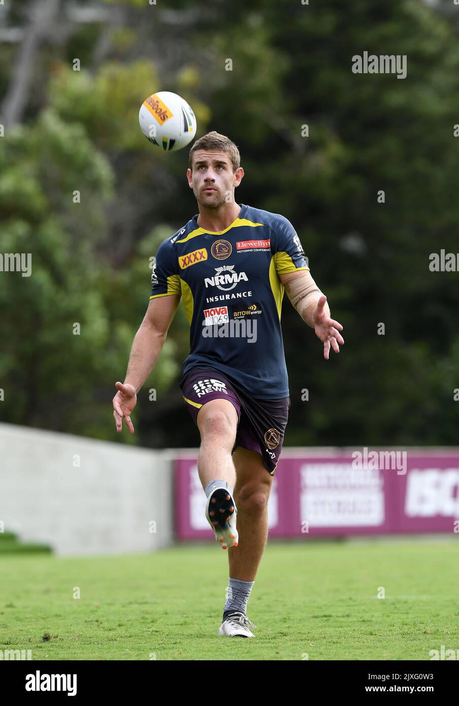 Andrew McCullough kicks during a Brisbane Broncos training session at ...