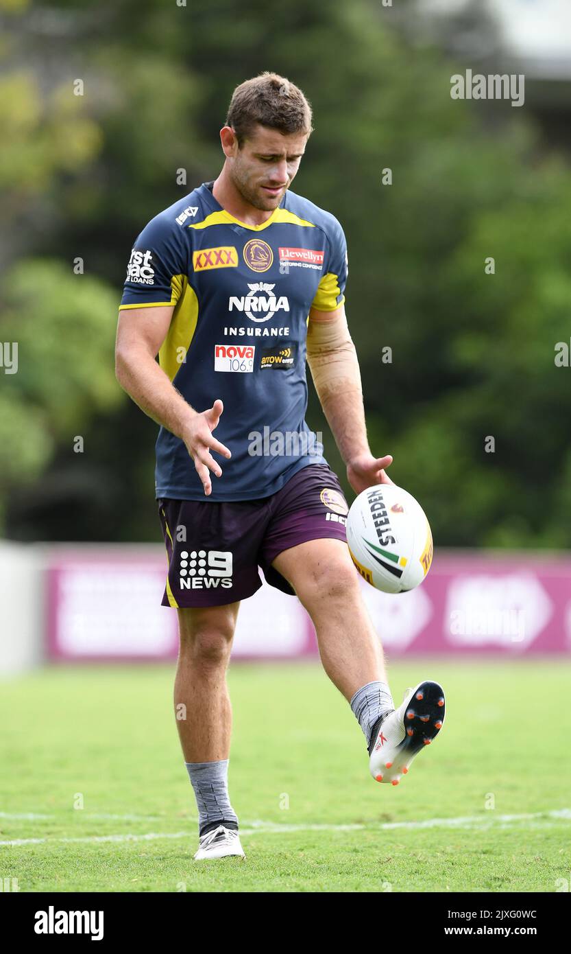 Andrew McCullough kicks during a Brisbane Broncos training session at ...