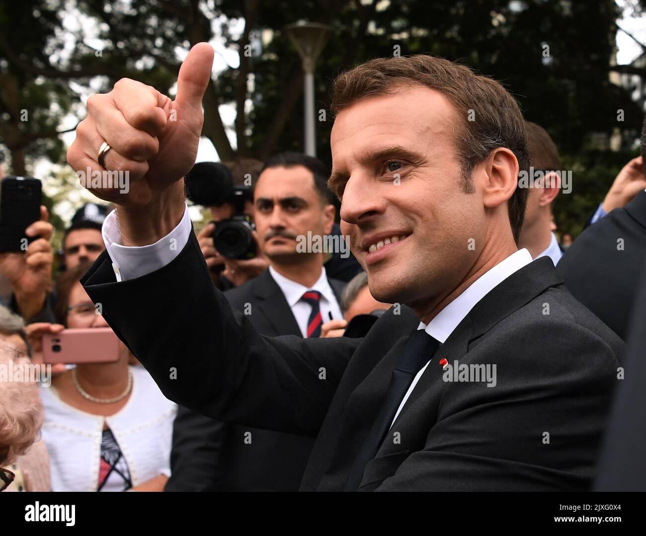 President of France Emmanuel Macron gestures to onlookers after a ...