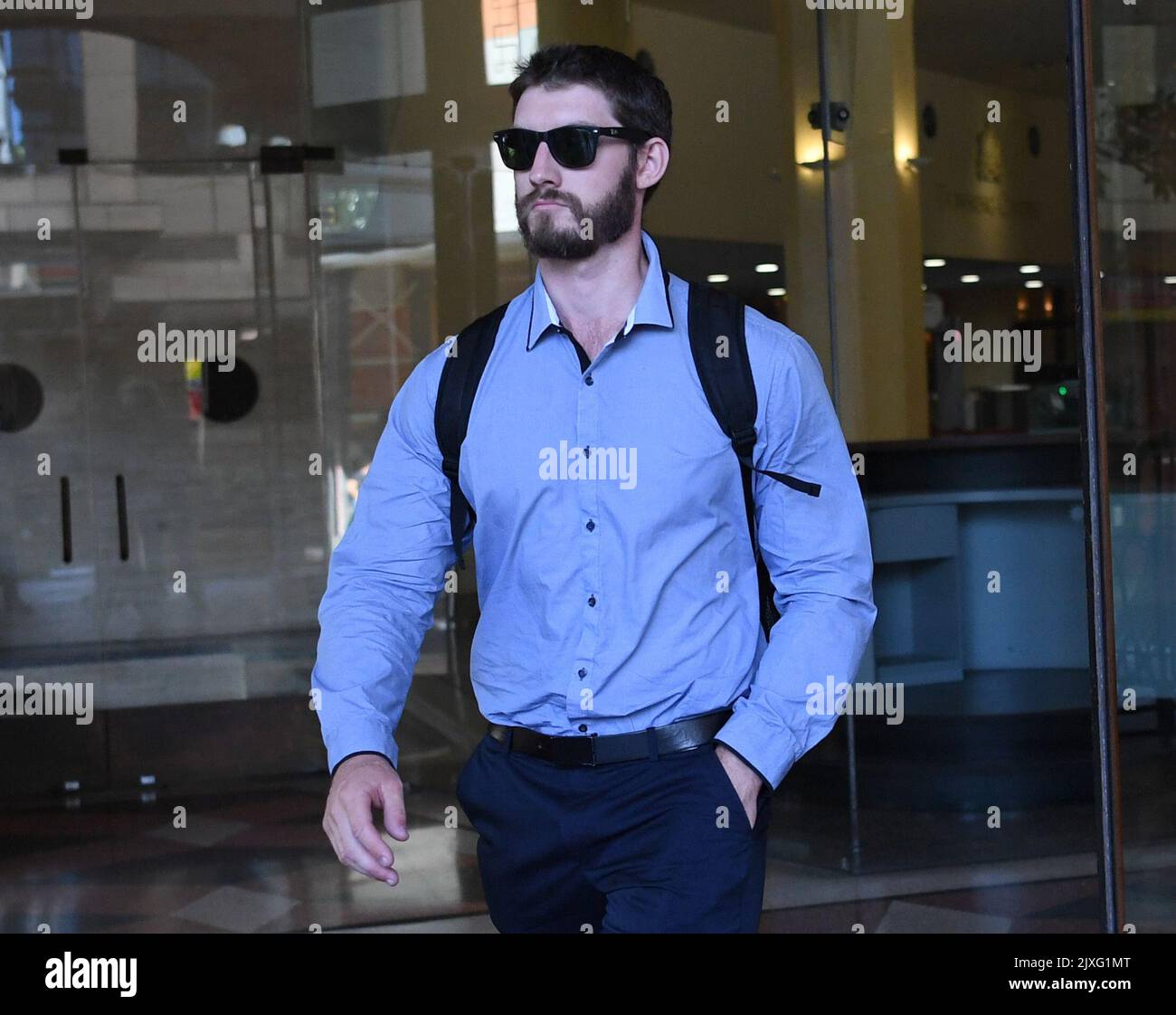 Timothy Patterson leaves the Downing Centre Court in Sydney, Thursday ...