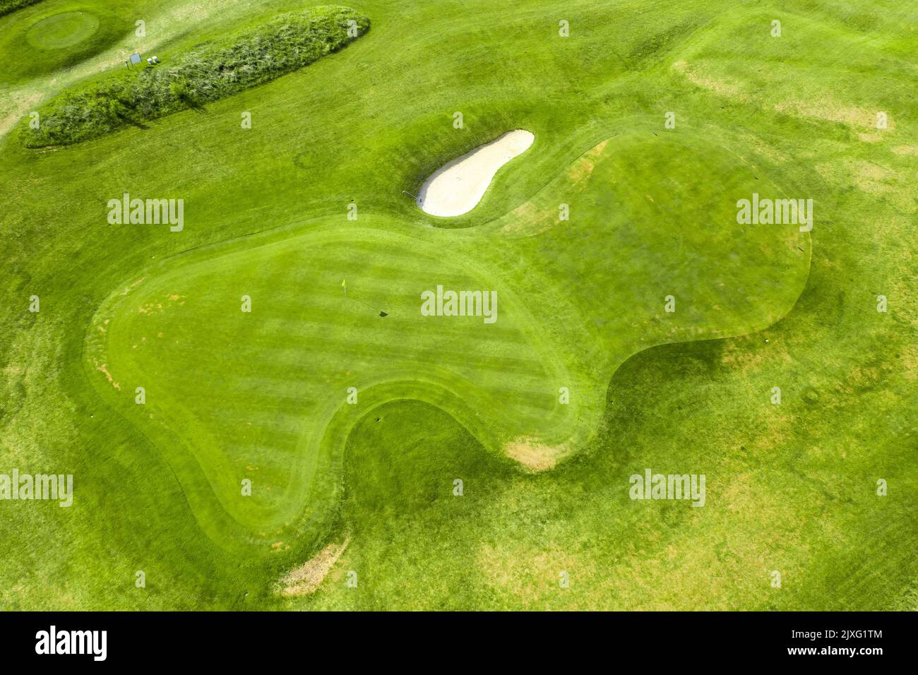 Aerial view of bunkers sand in golf court with putting green grass ...