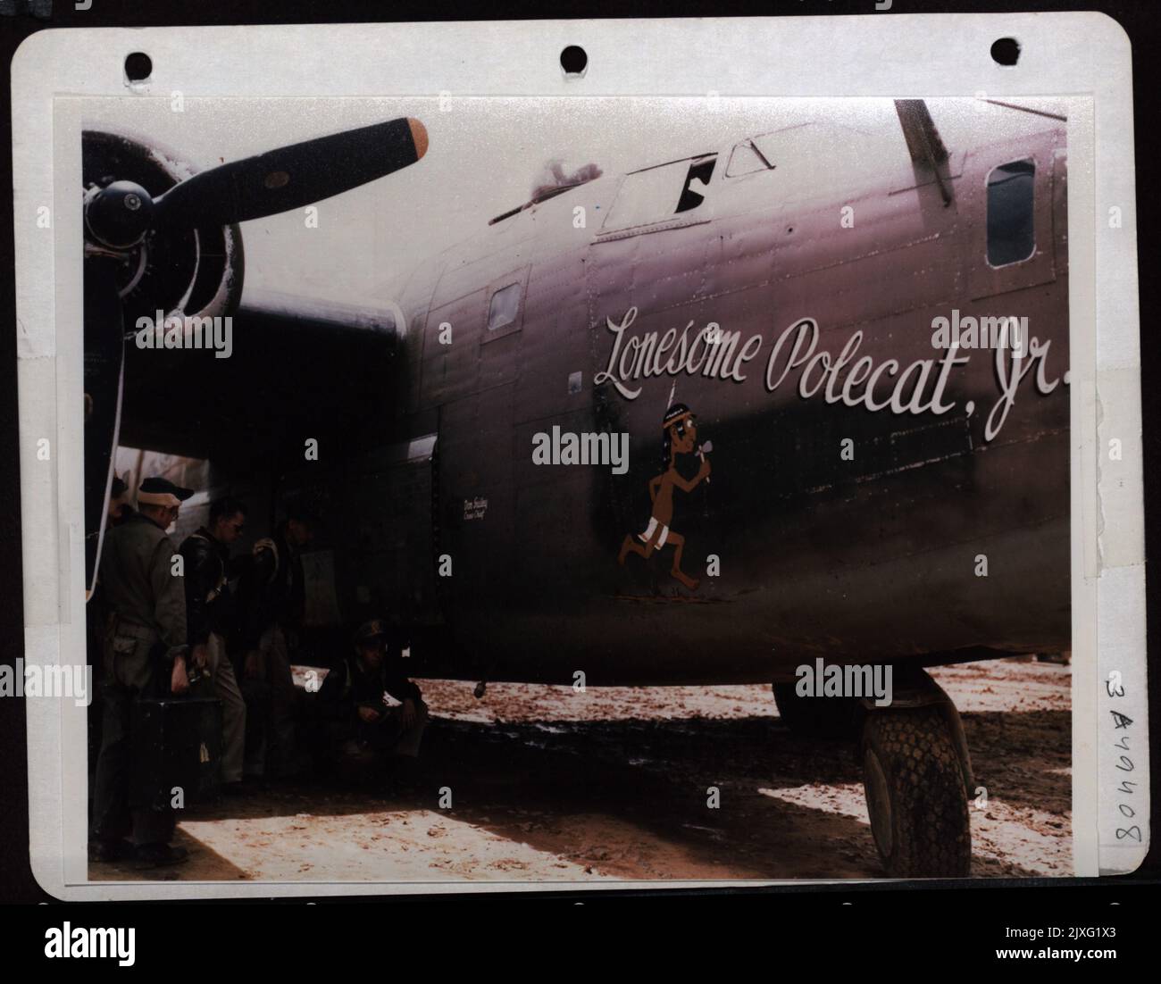 Pilot Of Consolidated B-24 Lonesome Polecat, Jr Climbing Into Ship; Copilot Is Ready To Follow ...