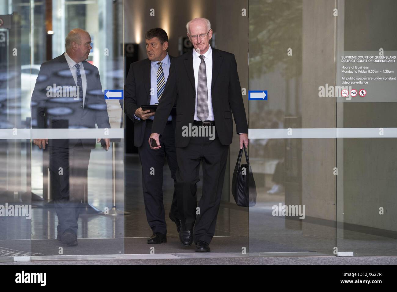 Former Fraser Coast mayor Chris Loft (right) leaves the Supreme Court ...