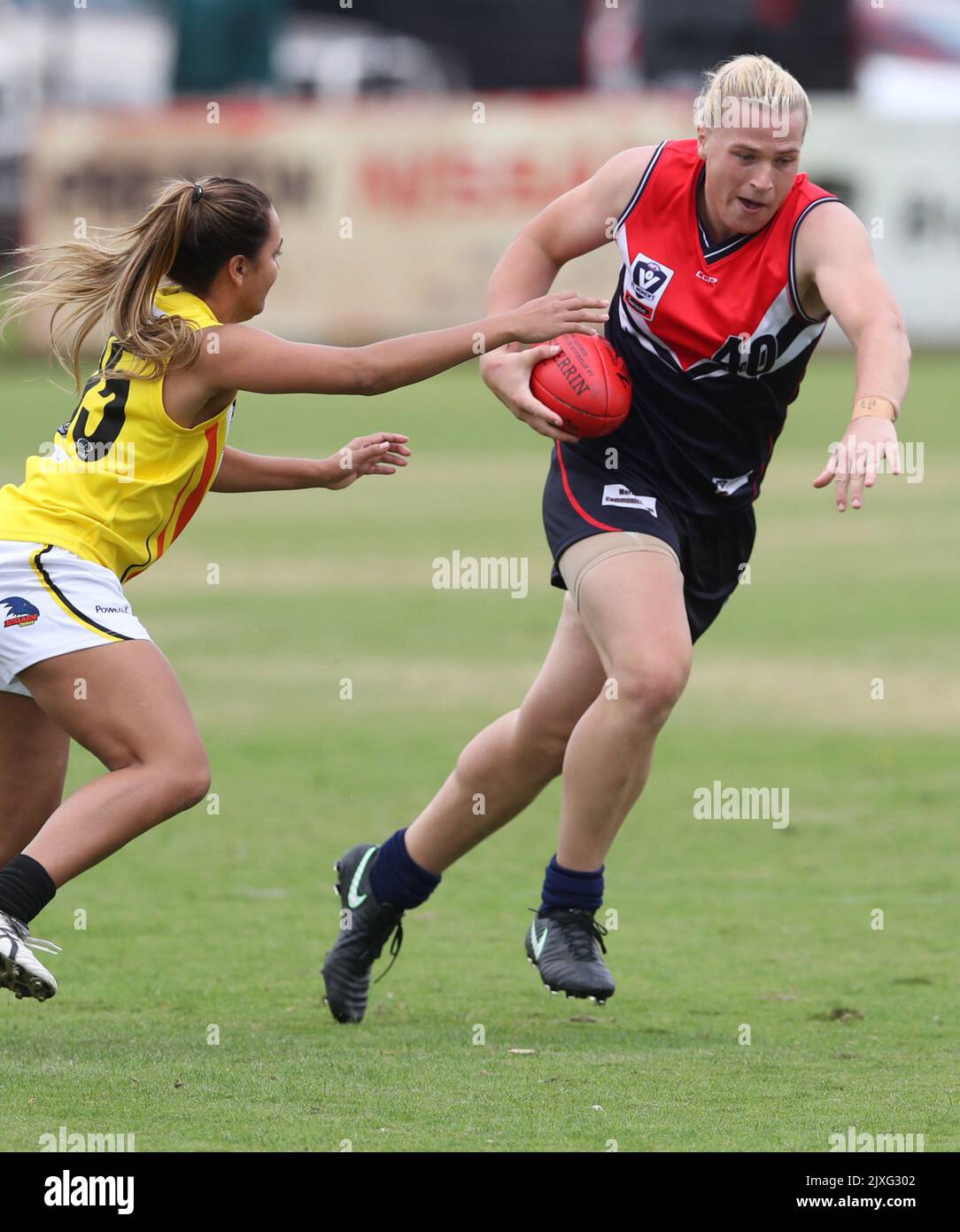 Transgender footballer Hannah Mouncey (R) playing in the VFLW Darabin ...