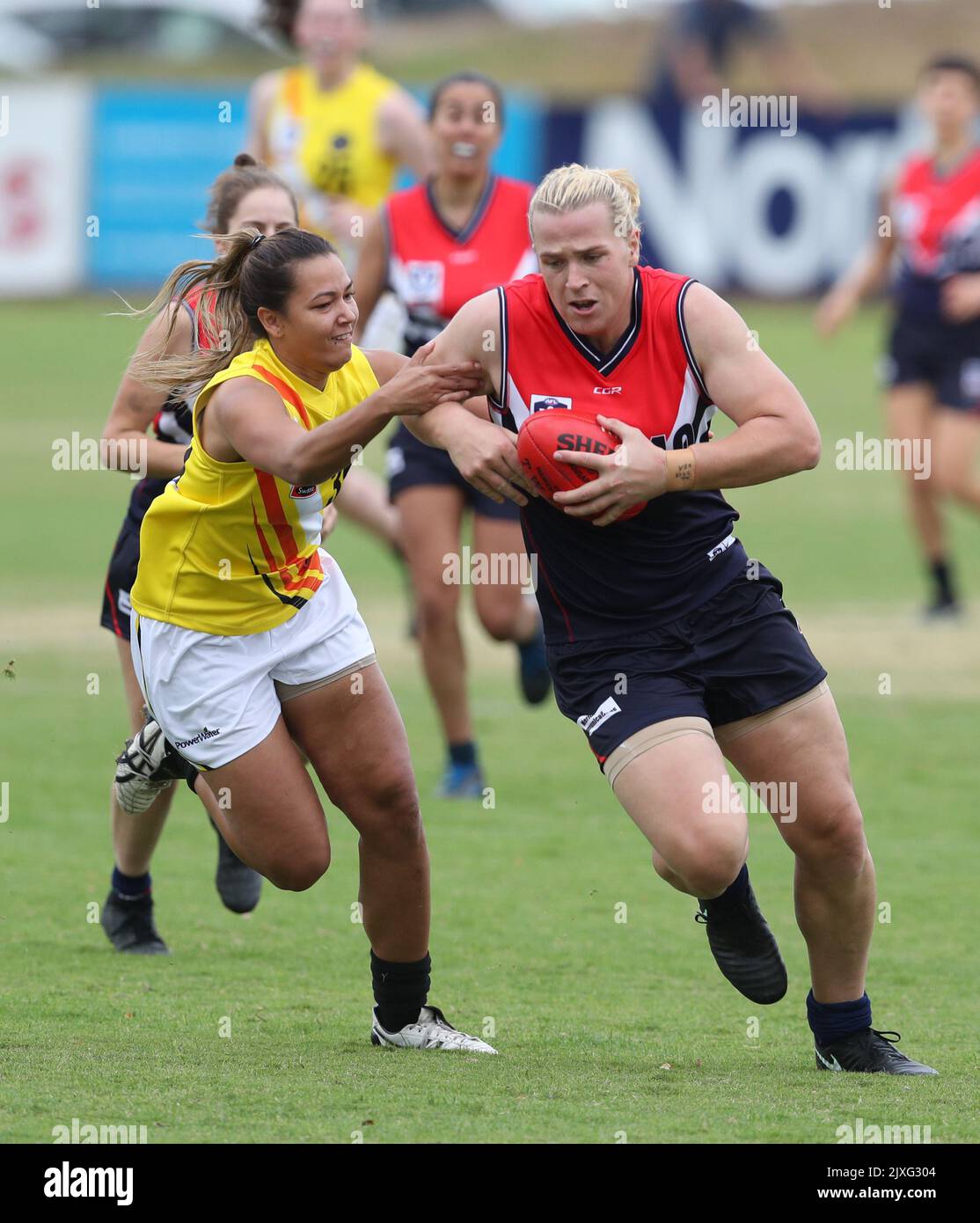 Transgender footballer Hannah Mouncey (R) playing in the VFLW Darabin ...