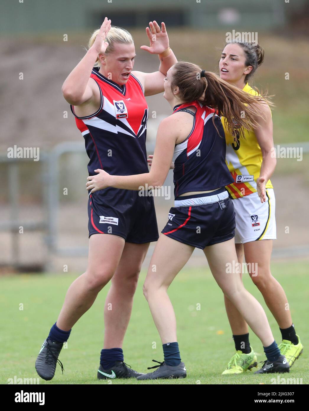 Transgender footballer Hannah Mouncey (L) playing in the VFLW Darabin ...