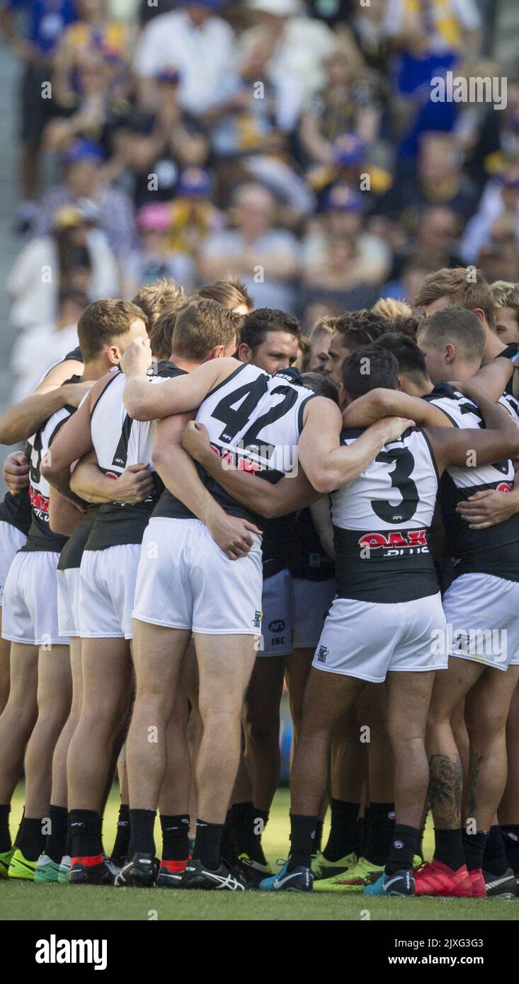 Power players huddle together during the Round 7 AFL match between the ...