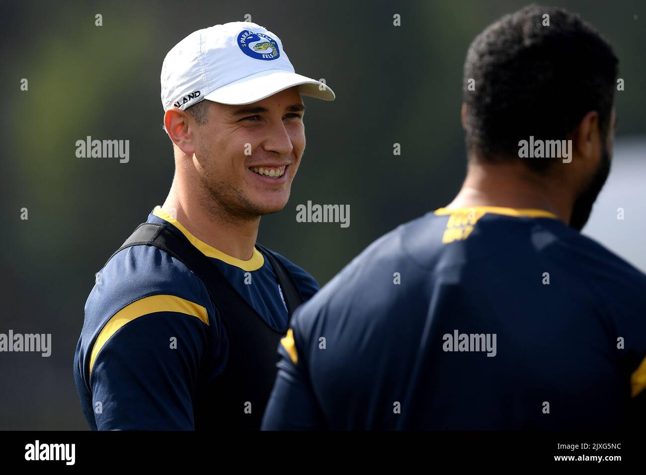 Parramatta Eels NRL player Mitchell Moses speaks with Michael Jennings ...