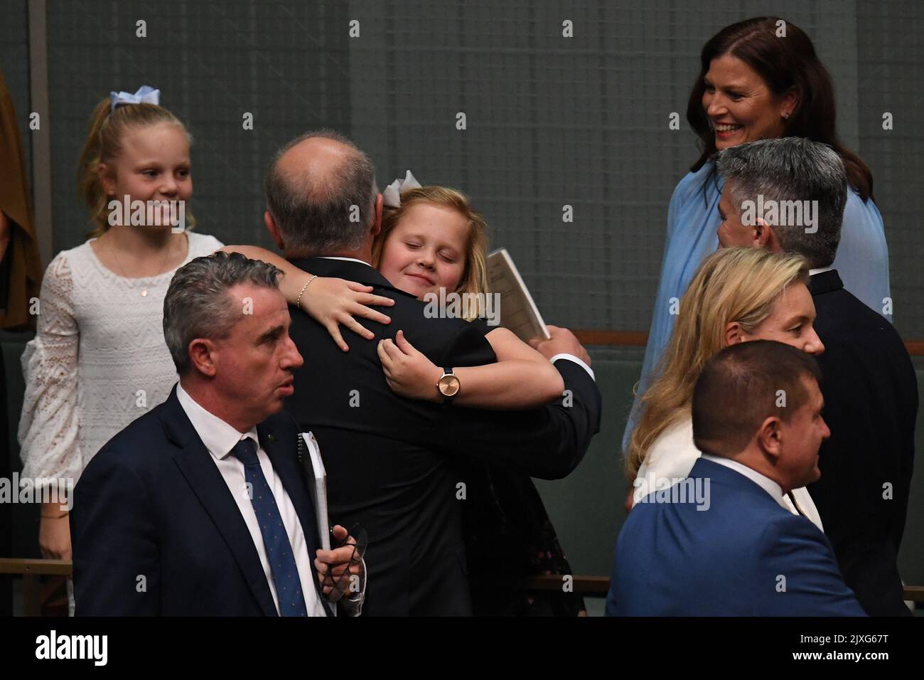 Federal Treasurer Scott Morrison is given a hug by his daughter Abbey ...