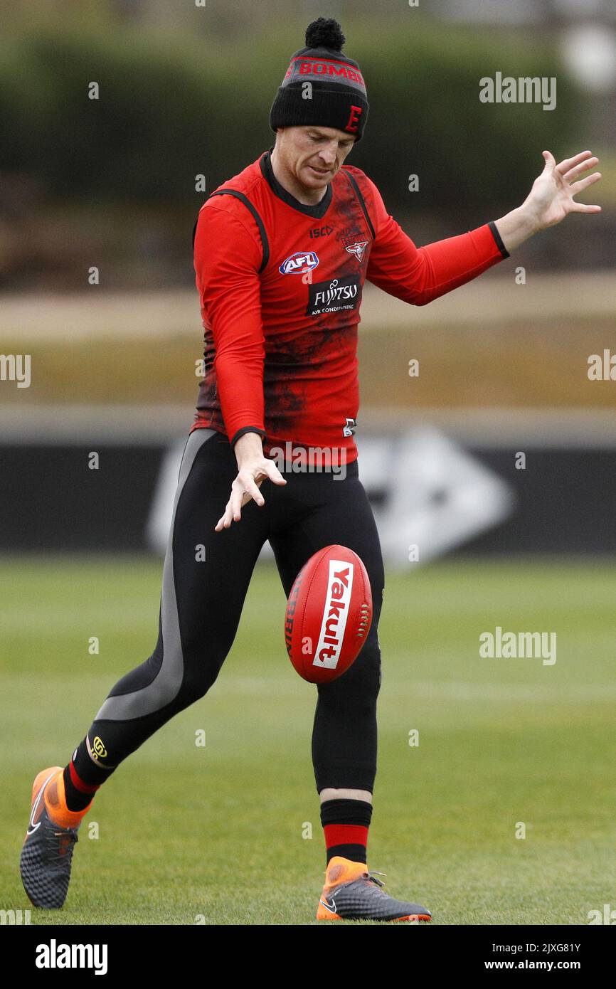 Essendon Bombers player Brendon Goddard kicks the ball during a team ...