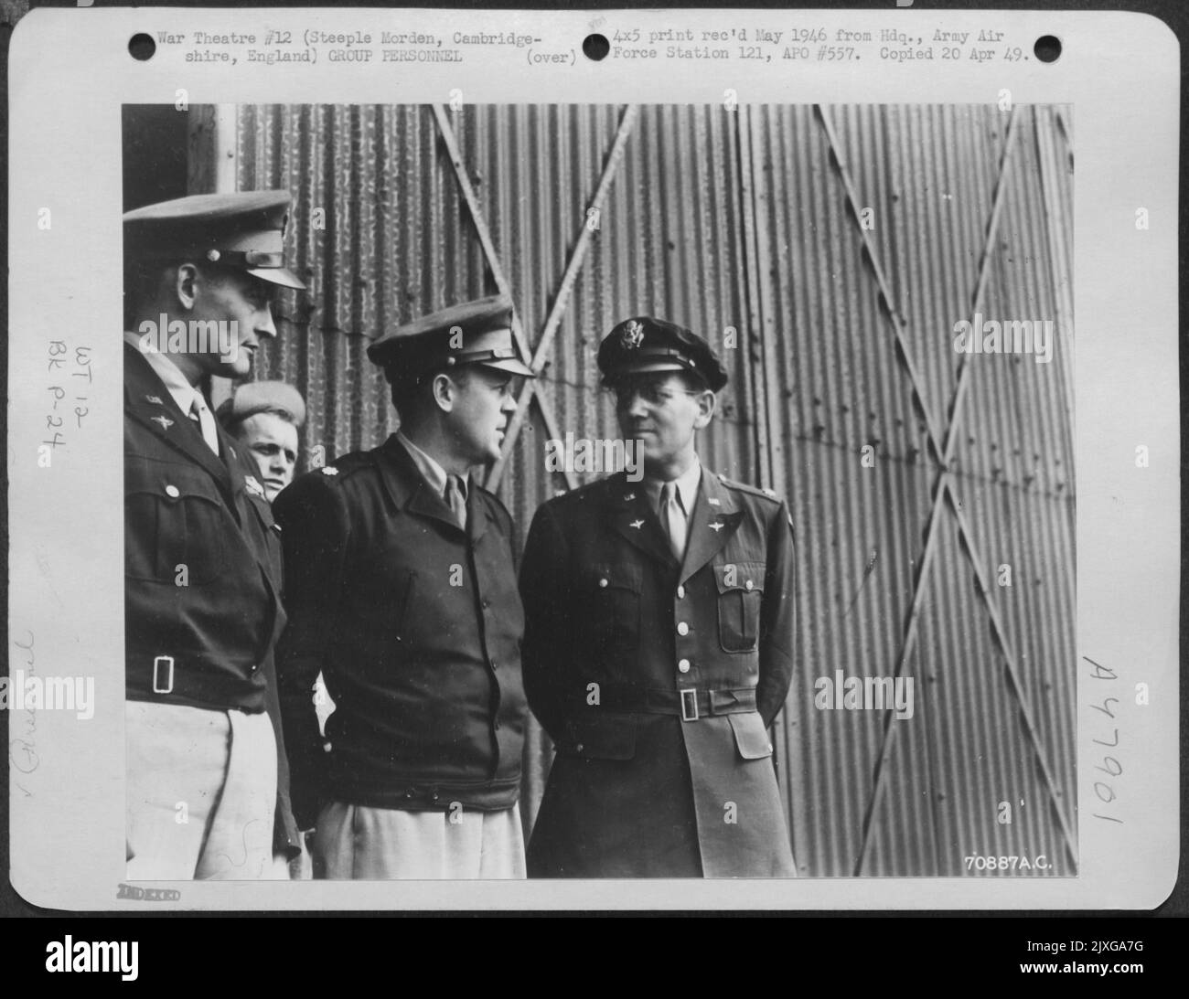 Major Glenn Miller (Right) Famous Band Leader, Talks With Two Officers ...