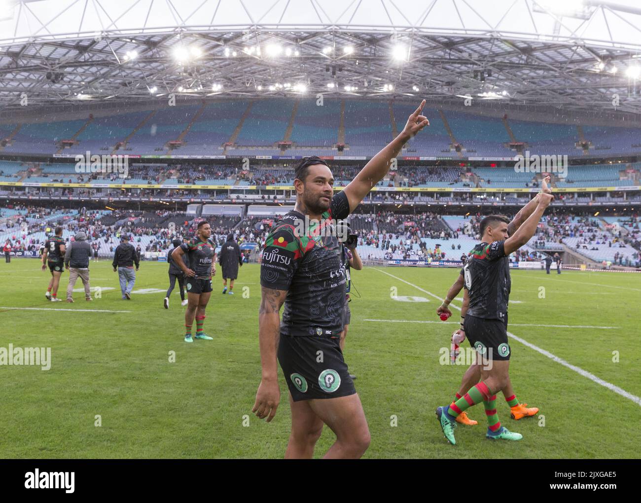John Sutton and the Rabbitohs applaud fans after the Round 10 NRL match ...