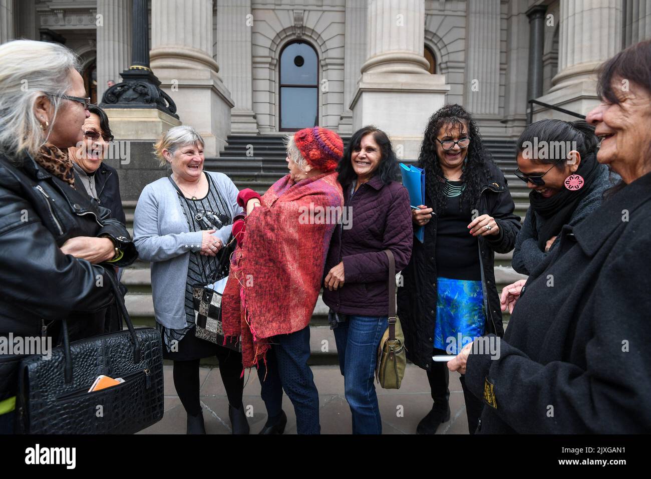 Gunnai and Gunitjmara woman Beryl Booth (4th left, in red) and ...