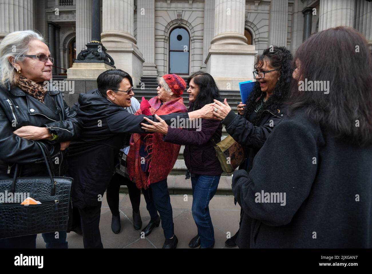 Gunnai and Gunitjmara woman Beryl Booth (third left, in red) and ...