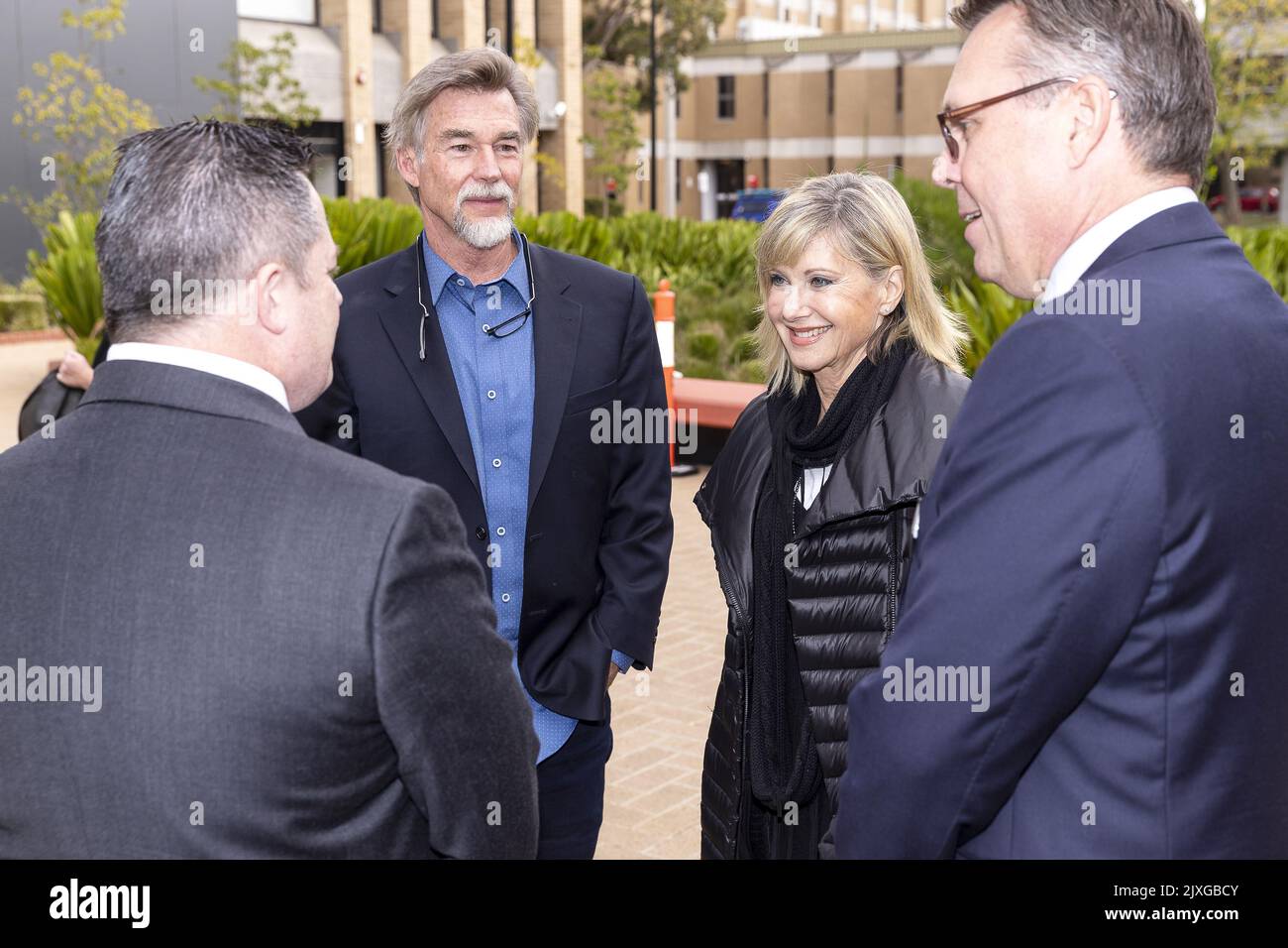 Olivia Newton-John arrives with with husband John Easterling (second ...