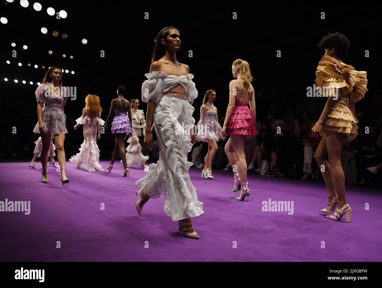 Models wear creations by Alice McCall during the Mercedes-Benz Fashion ...
