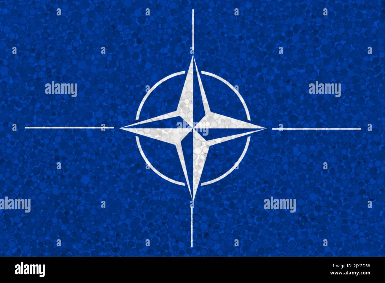 Flag of NATO on styrofoam texture. flag painted on the surface of ...
