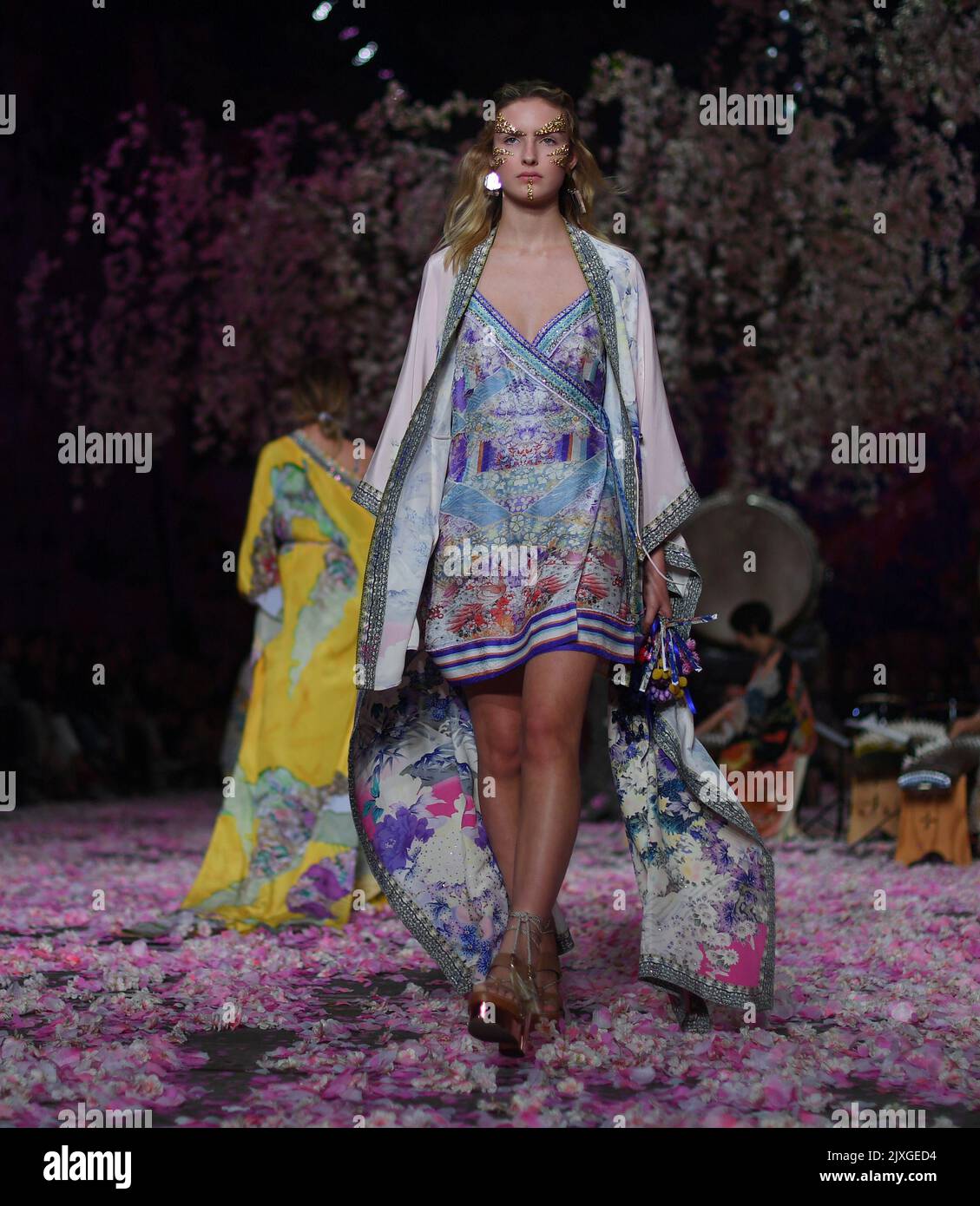 A model wears a creation by Camilla during her fashion show during the ...