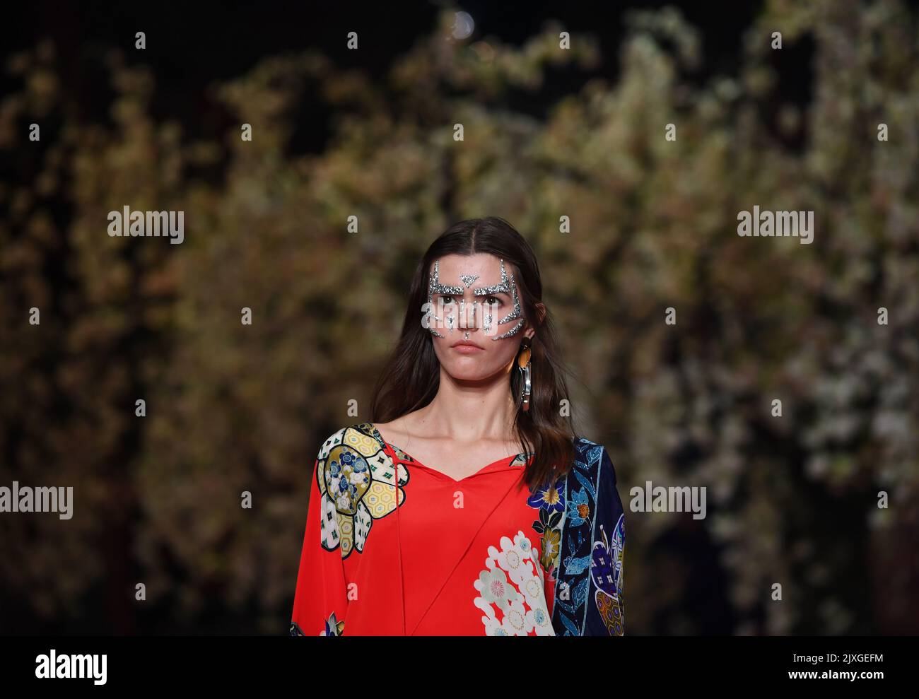 A model wears a creation by Camilla during her fashion show during the ...