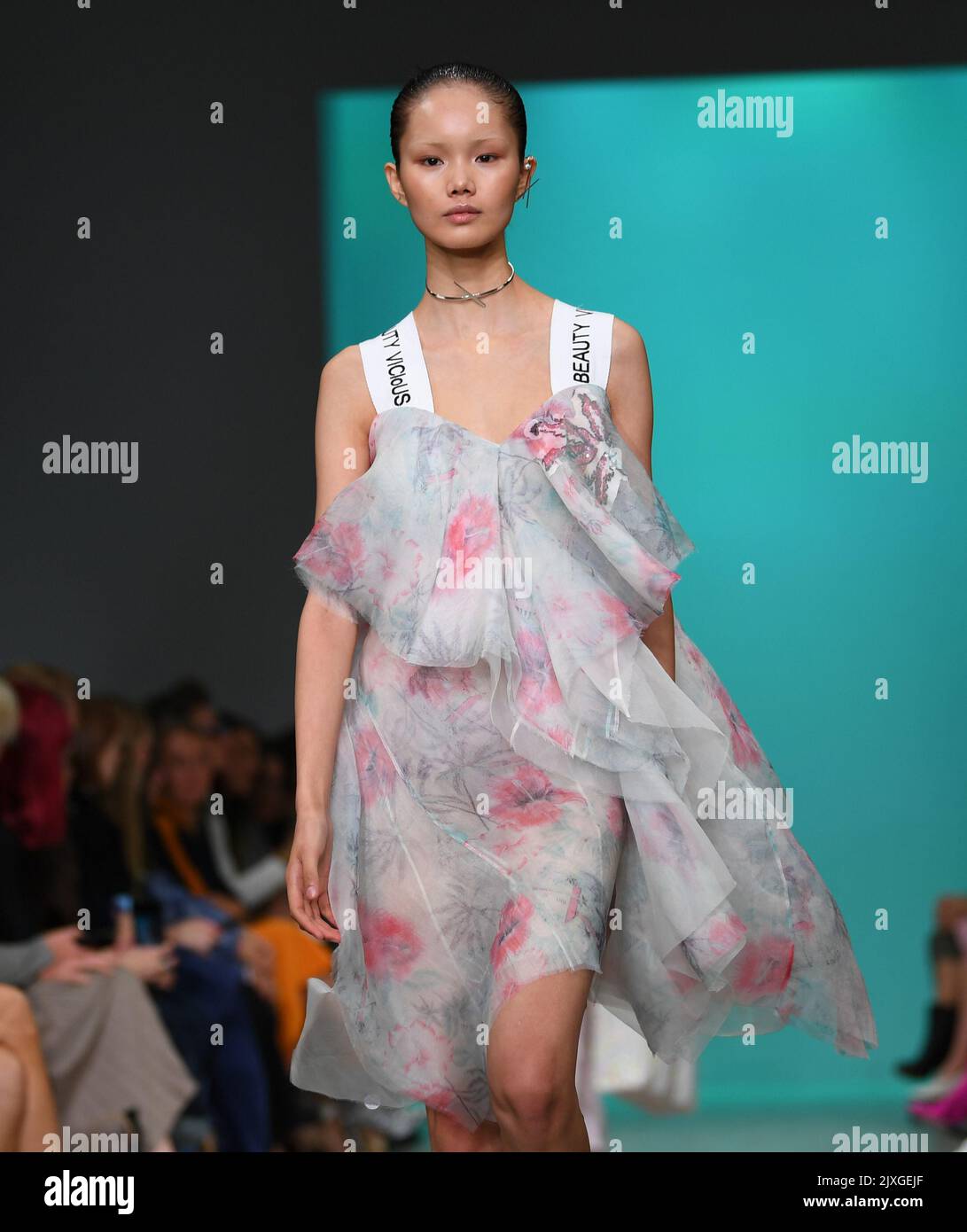 A model wears a creation by Akira during the Mercedes-Benz Fashion Week ...