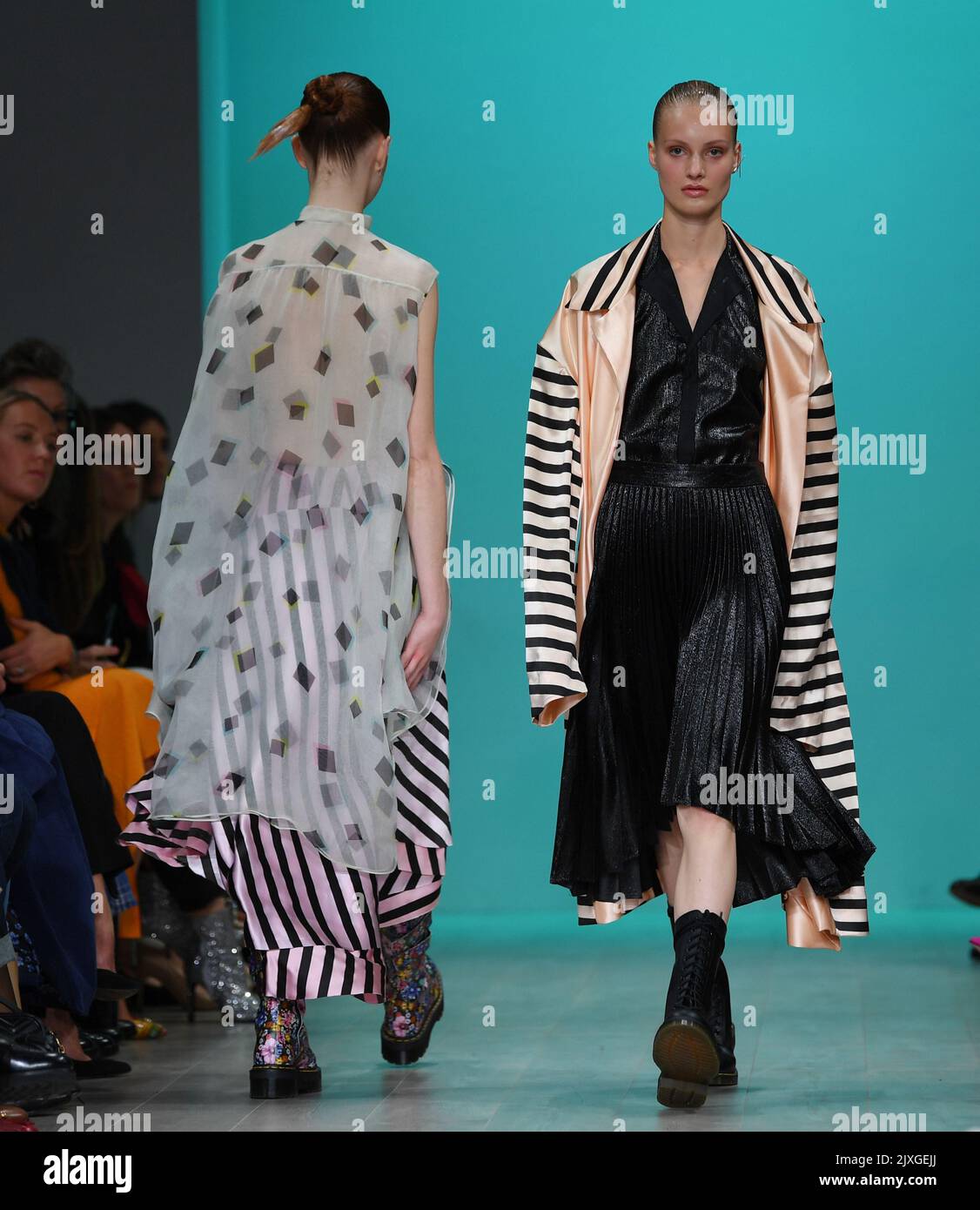 A model wears a creation by Akira during the Mercedes-Benz Fashion Week ...