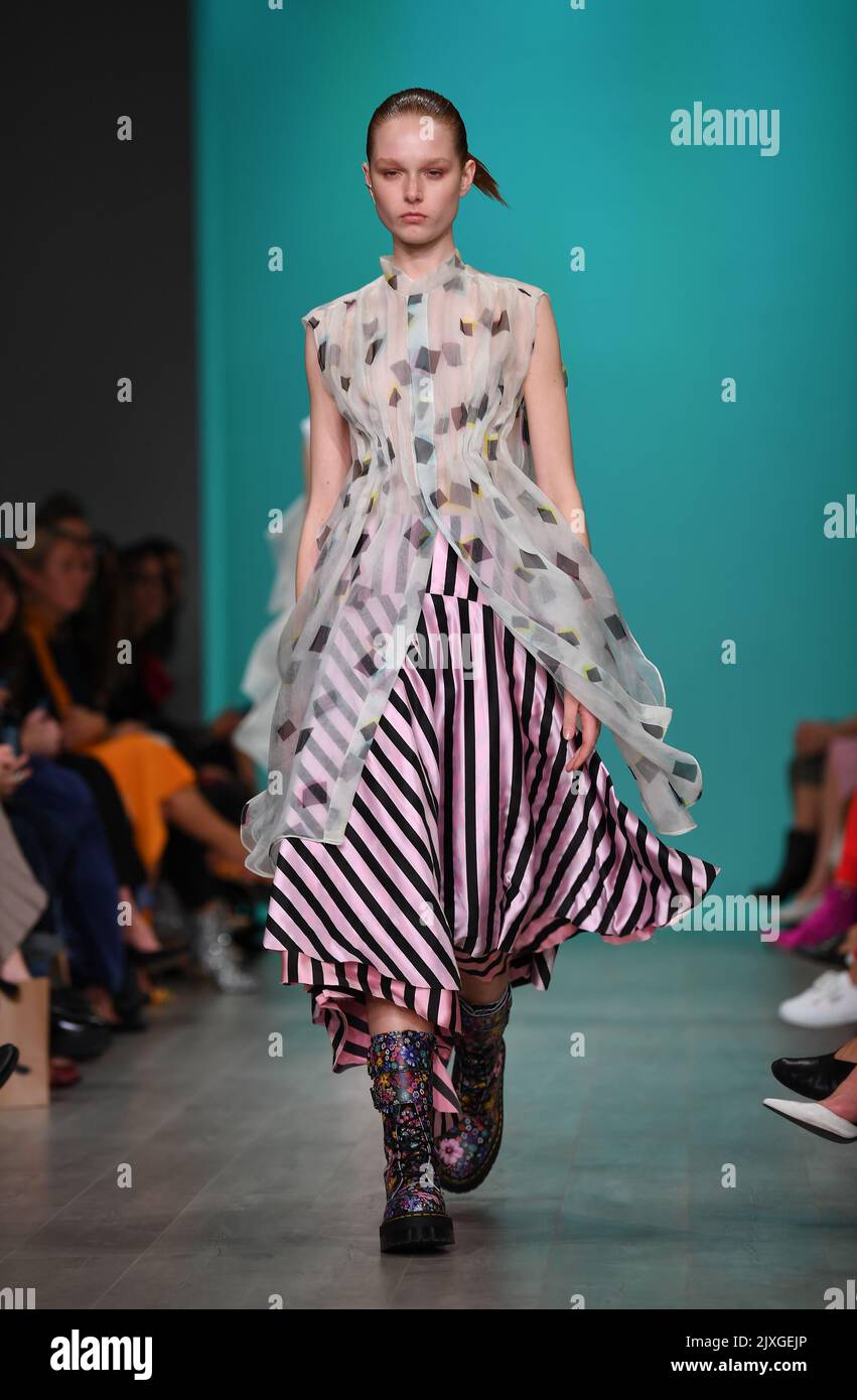 A model wears a creation by Akira during the Mercedes-Benz Fashion Week ...