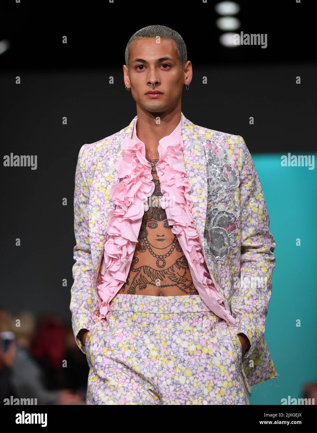 A model wears a creation by Akira during the Mercedes-Benz Fashion Week ...