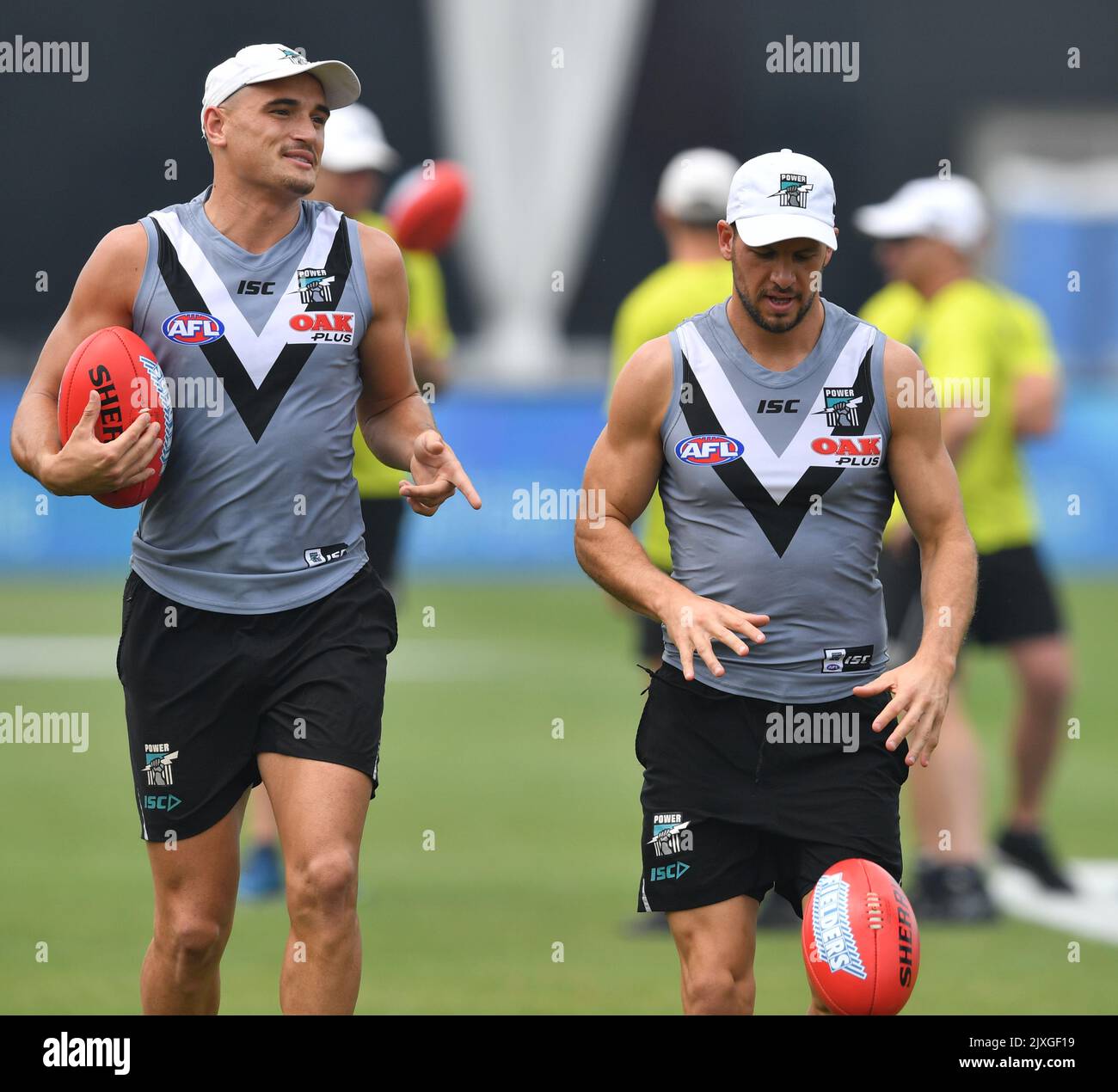 Travis Boak (left) and Sam Powell-Pepper of the Power are seen during a ...
