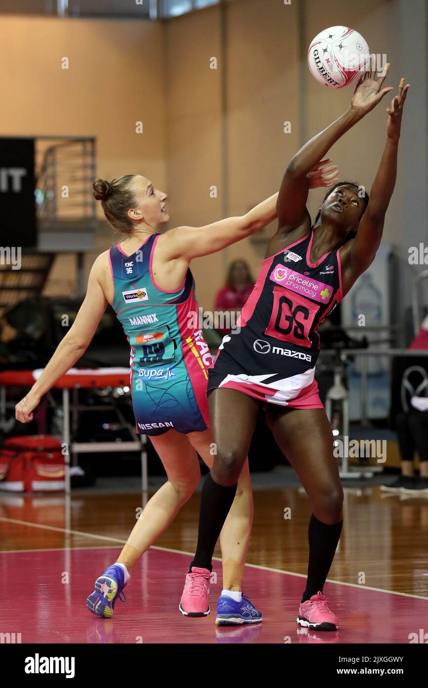 Emily Mannix of the Melbourne Vixens competes with Shimona Nelson of ...