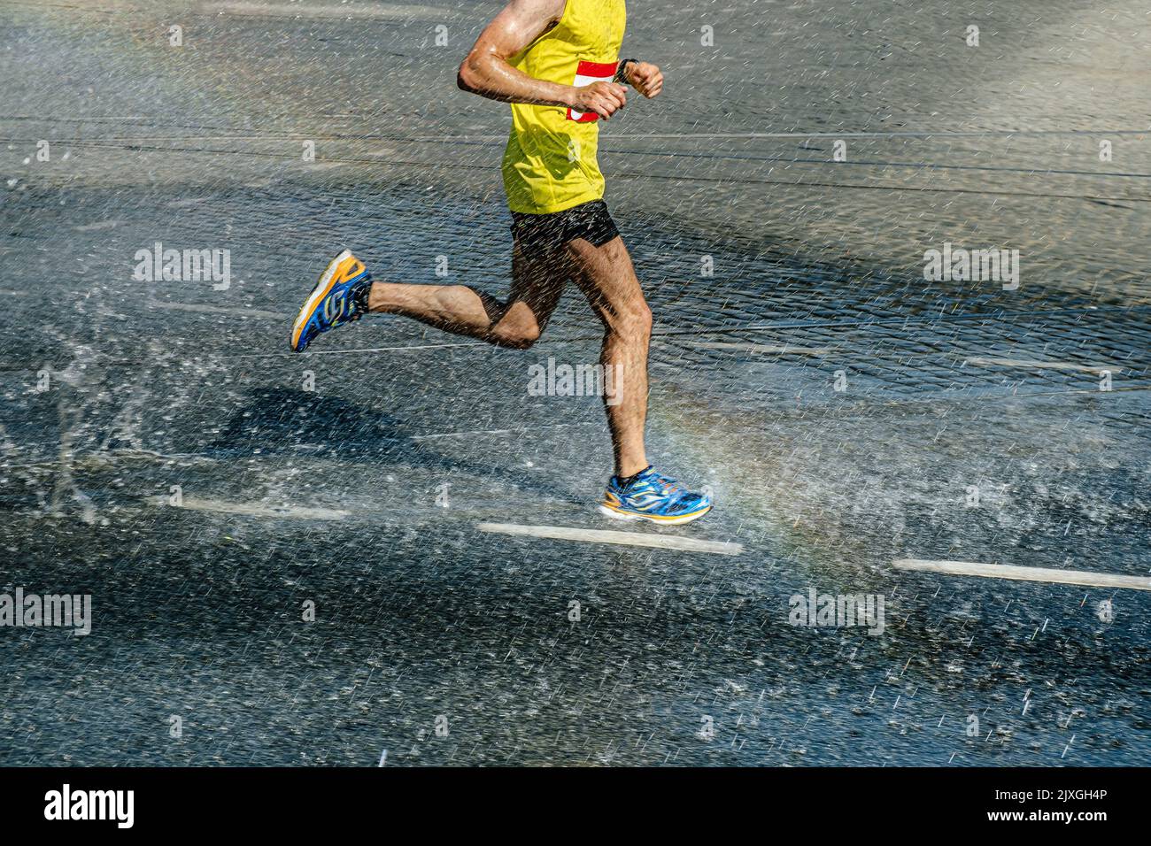 athlete runner run water splashes and rainbow Stock Photo - Alamy