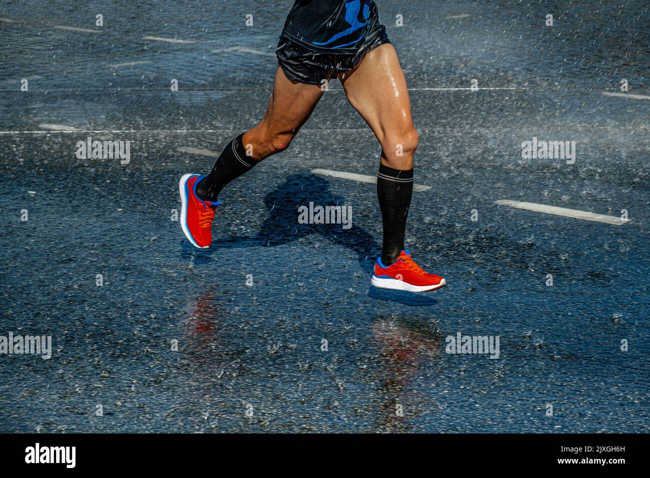 Running feet rain hi-res stock photography and images - Alamy