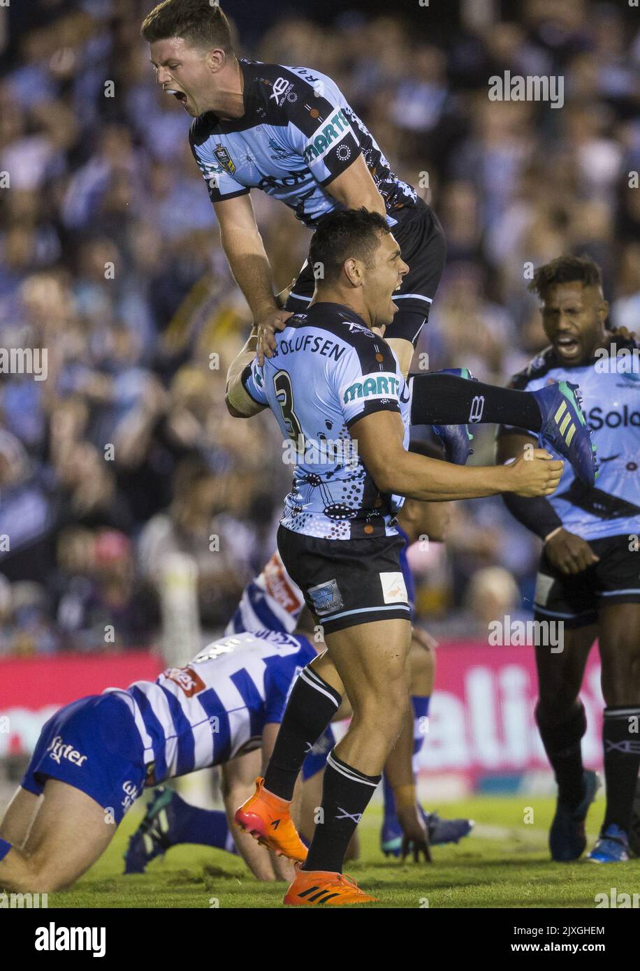 Jesse Ramien of the Sharks scores and Chad Townsend of the Sharks jumps ...