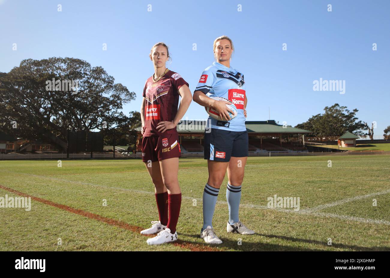 Queensland captain Karina Brown (left) and NSW captain Ruan Sims pose ...