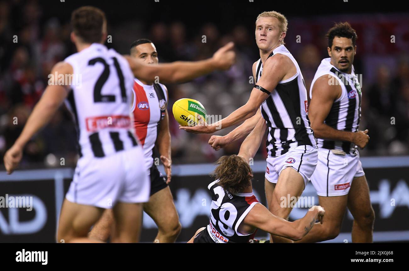 Jaidyn Stephenson of the Magpies (second from right) is seen in action ...