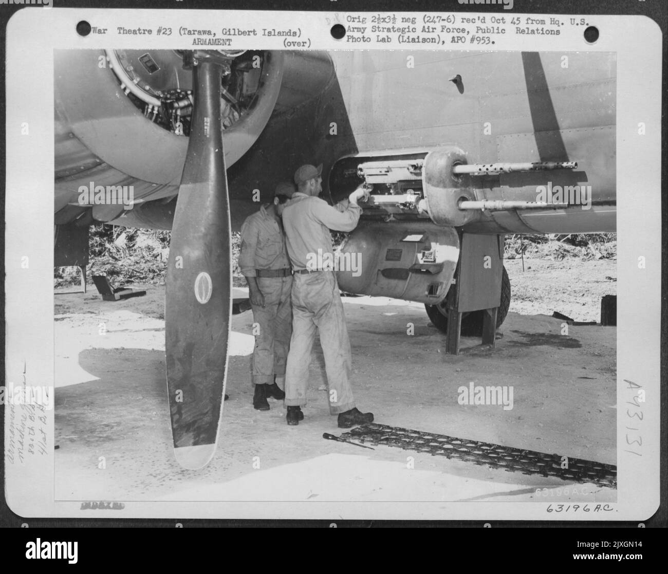 Armorers Check .50 Cal Machine Guns Mounted On A North American B-25 ...