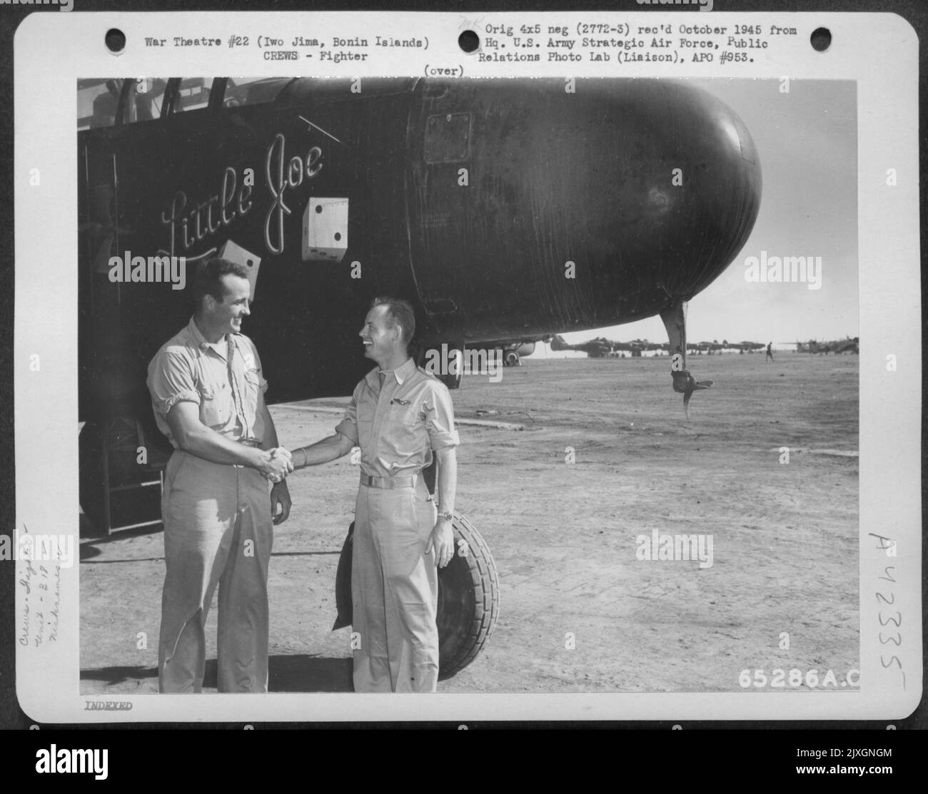 Two Pilots Of The 318Th Fighter Group Shaking Hands Beside The Northrop ...