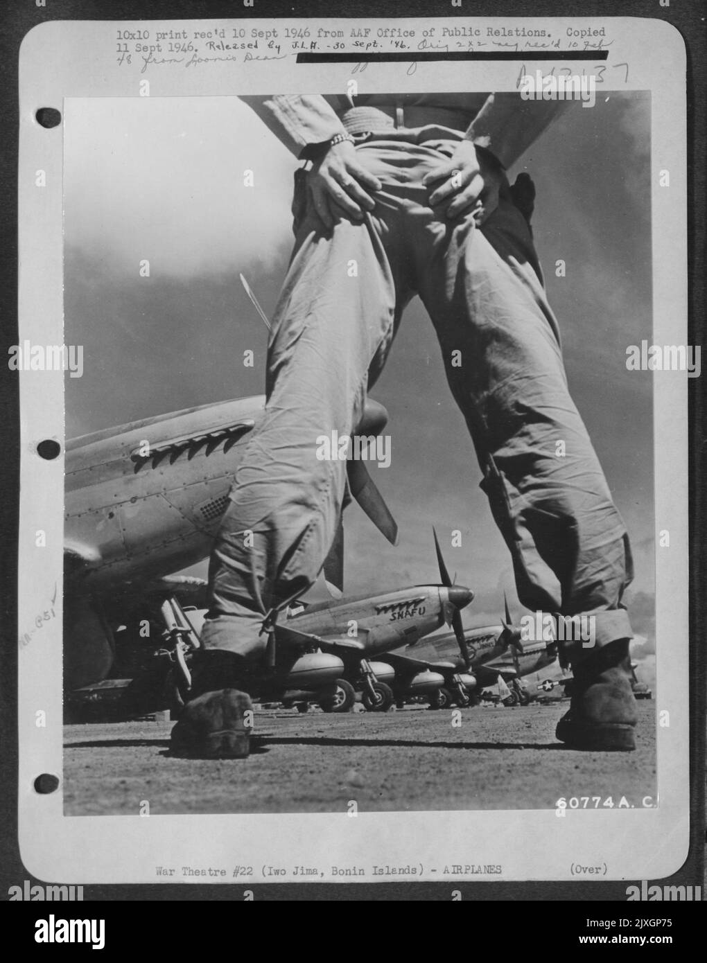A Tired Pilot And North American P-51 "Mustangs" On The Line At Iwo ...