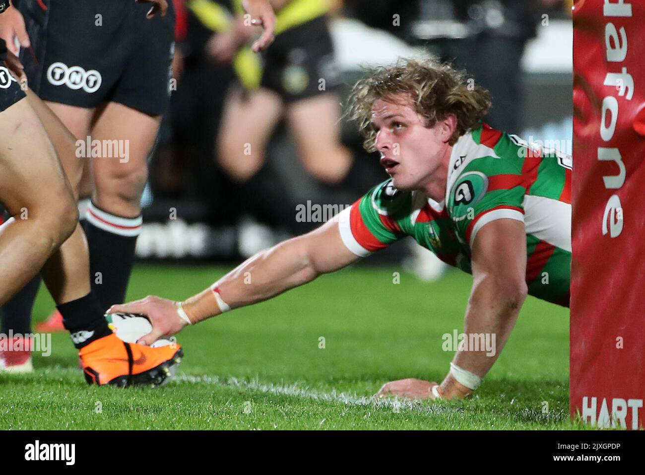 George Burgess of the Rabbitohs (centre) scores a try during the Round ...