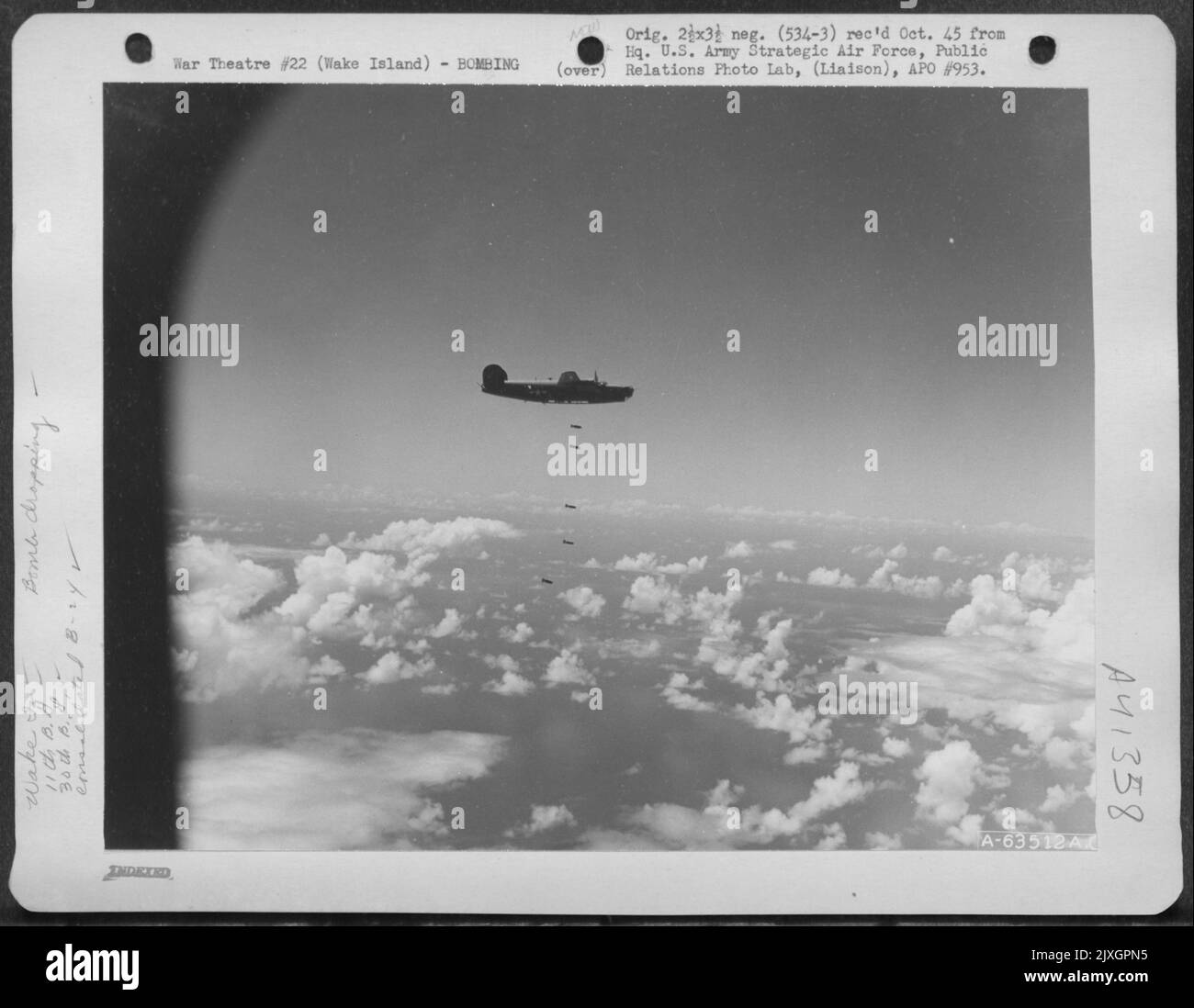 Bombs Fall From Consolidated B-24 Liberator During Raid Over Wake ...