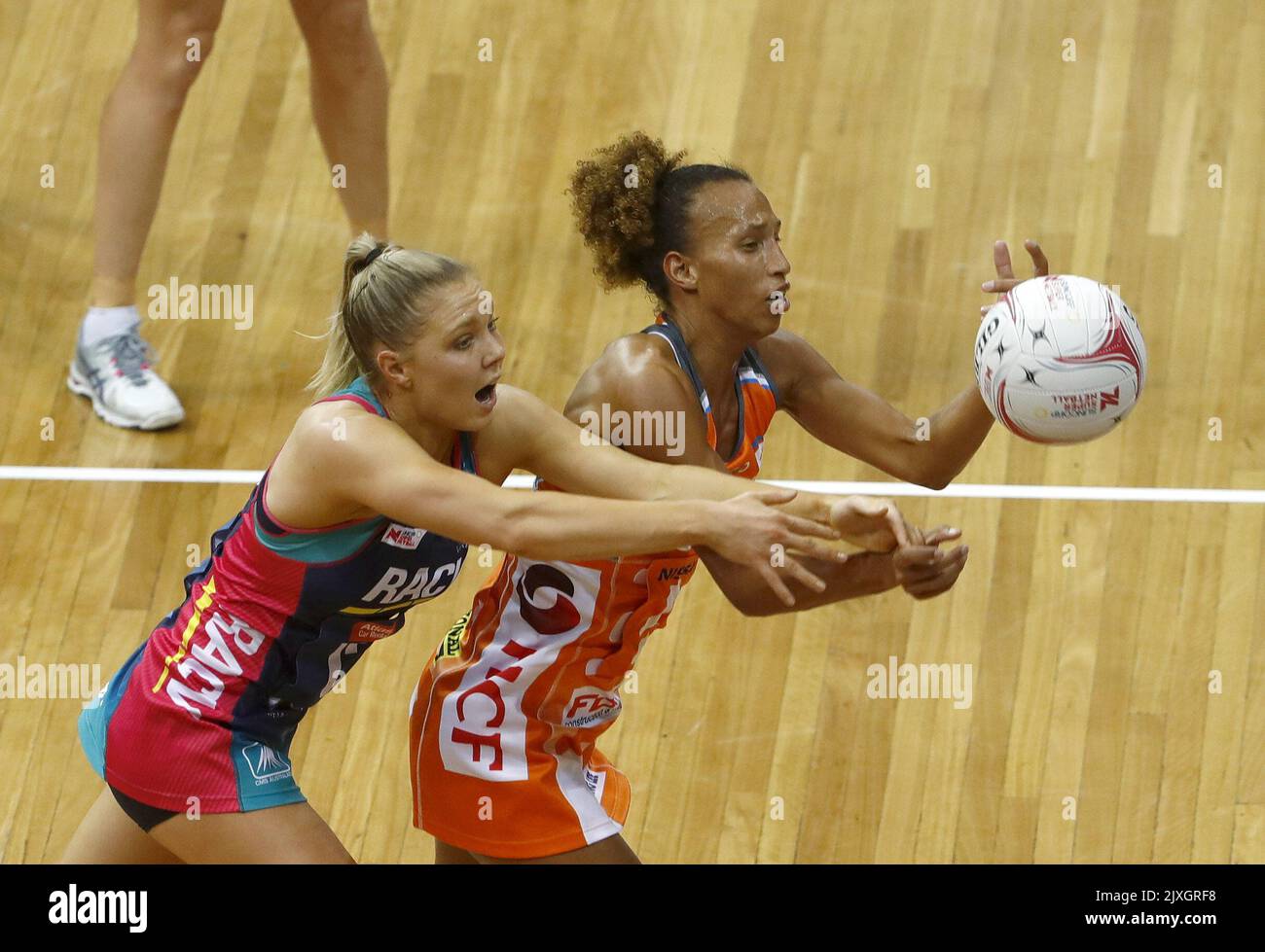 Kate Moloney of the Vixens fights for the ball against Serena Guthrie ...