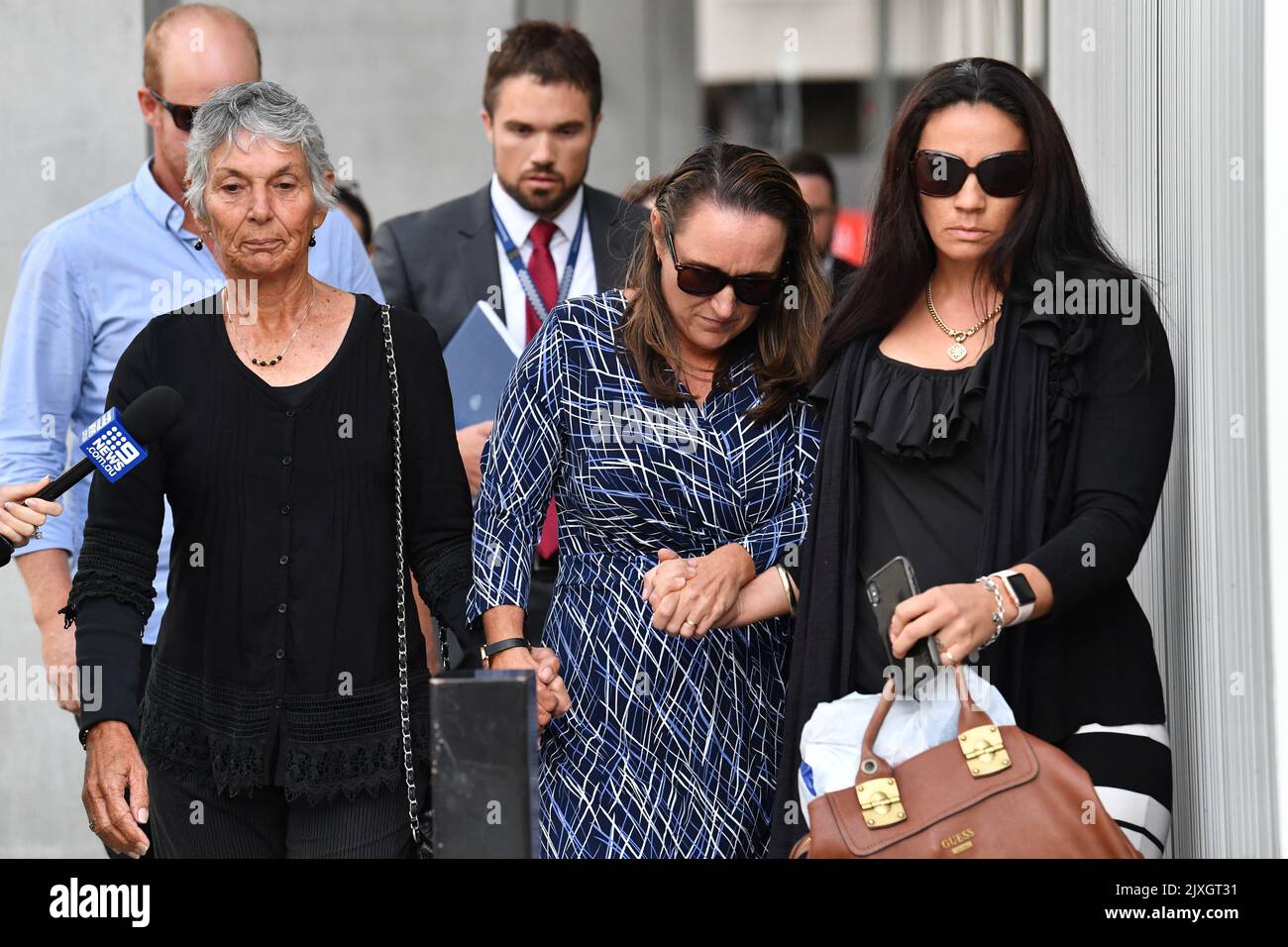 The family and friends of murder victim Greg Dufty are seen leaving the ...