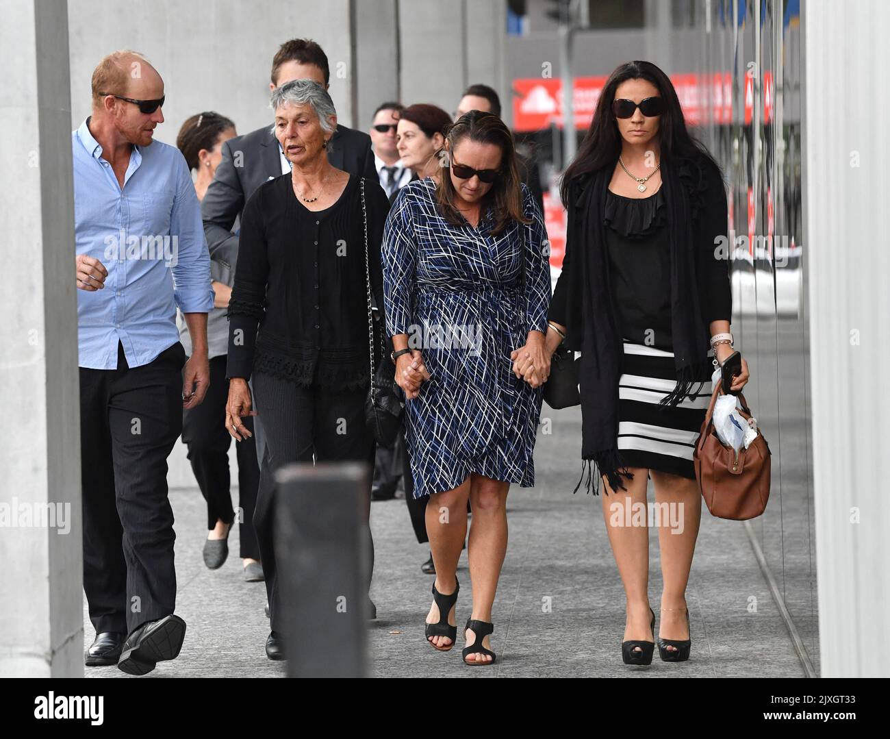 The family and friends of murder victim Greg Dufty are seen leaving the ...