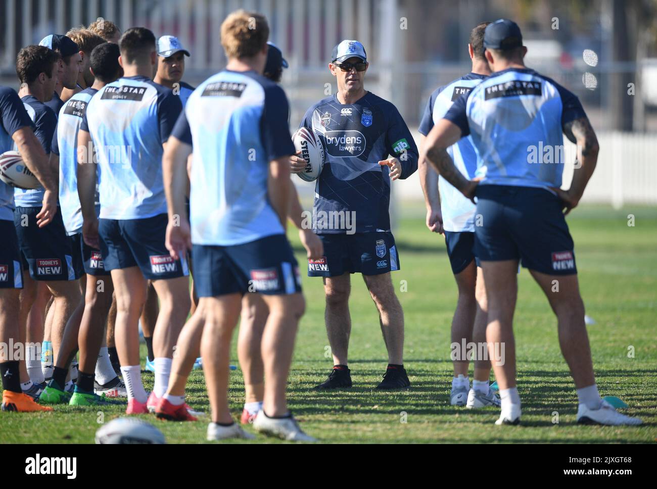 NSW Blues head coach Brad Fittler (centre) speaks to his players during ...